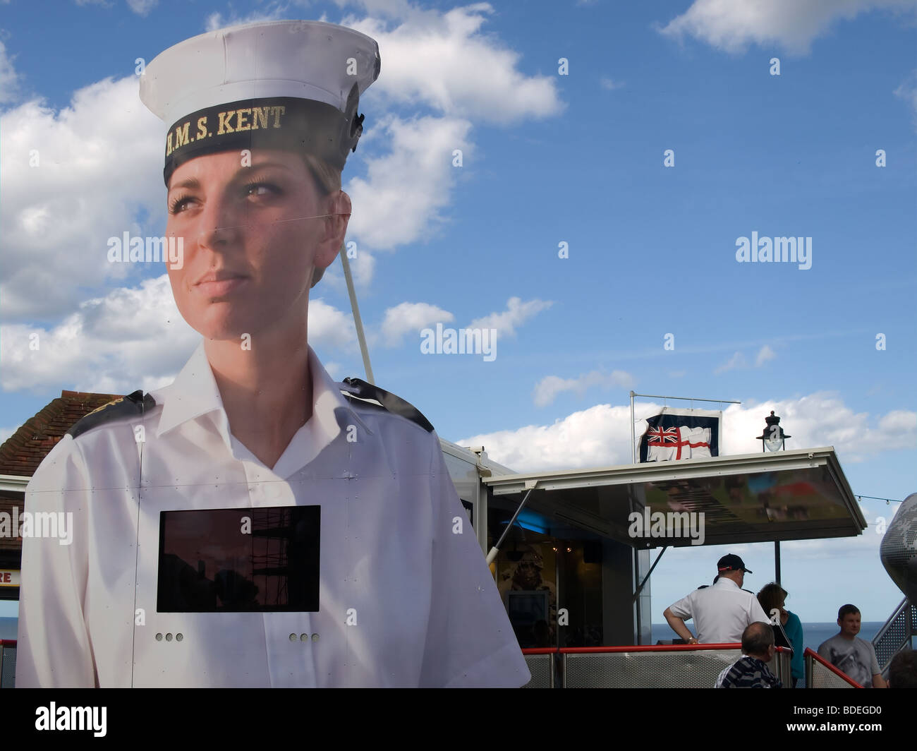 Large poster of a female sailor at a Royal Navy recruiting display ...