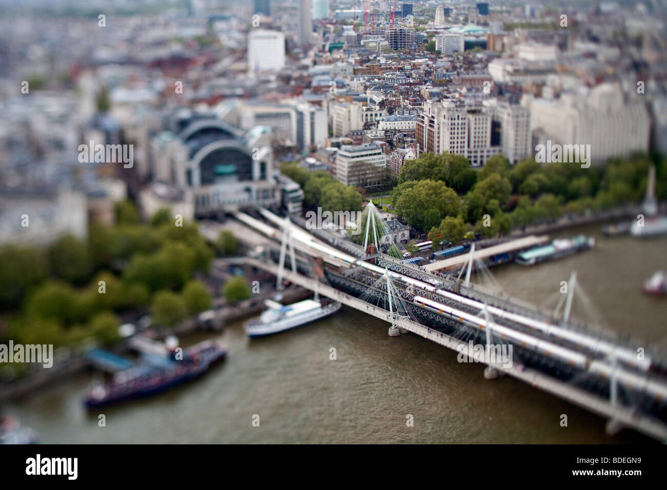 Aerial view of Hungerford bridge over the Thames and Charing Cross ...