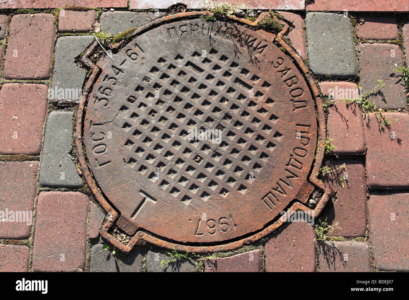 Manhole cover cast iron letters hi-res stock photography and images - Alamy