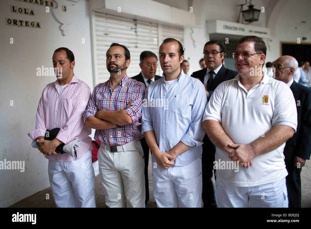 Costaleros or float bearers getting ready for the Corpus Christi ...