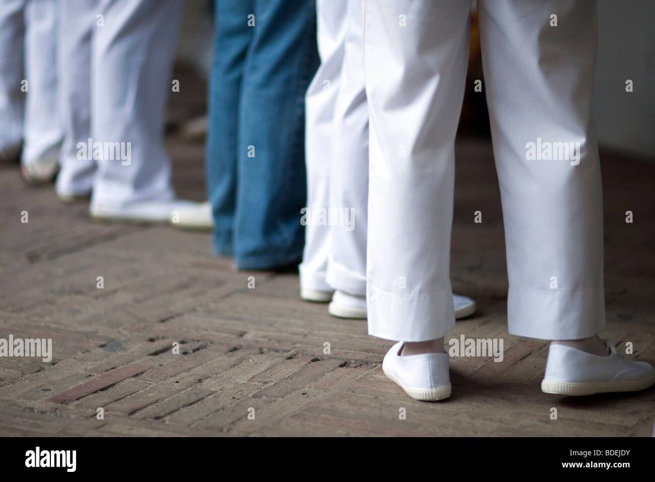 Costaleros (flat bearers) legs. Corpus Christi procession, Seville ...