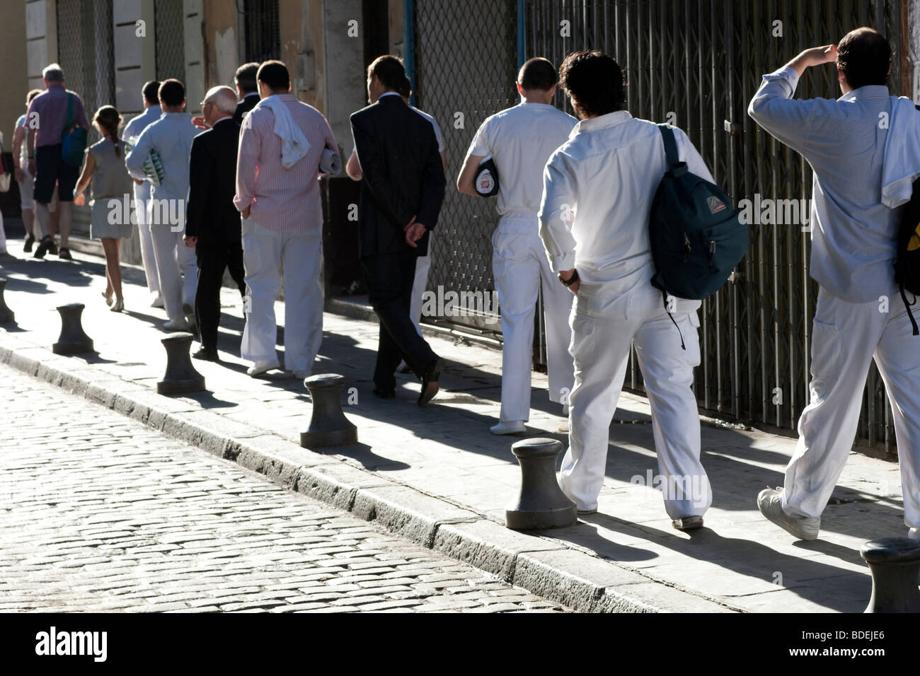 Costaleros (float bearers) going to the church for the Corpus Christi ...