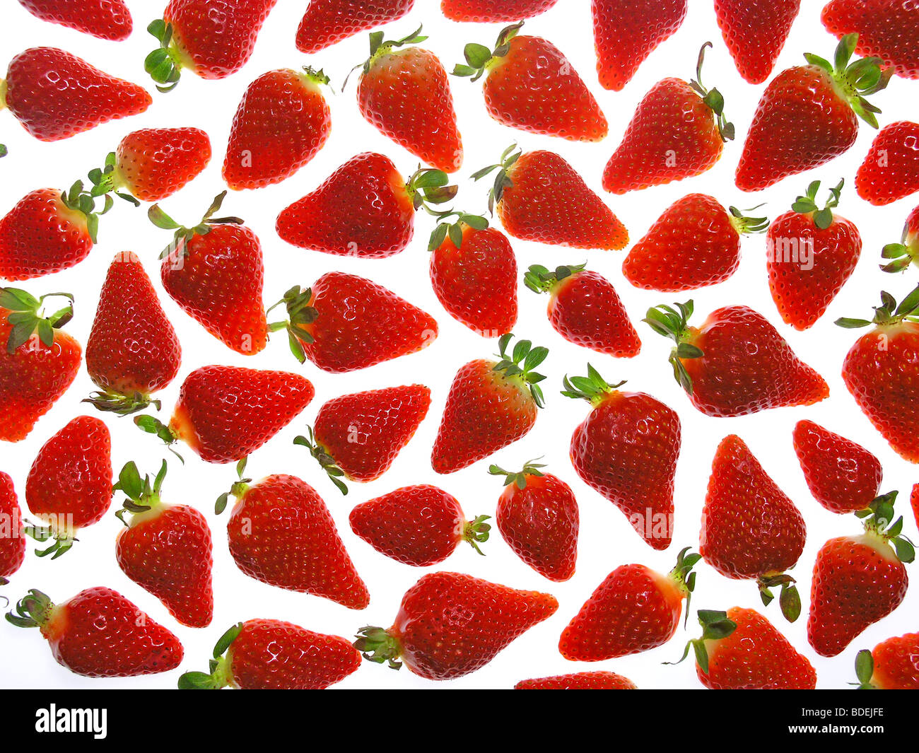 Strawberries cut in transparent hi-res stock photography and images - Alamy