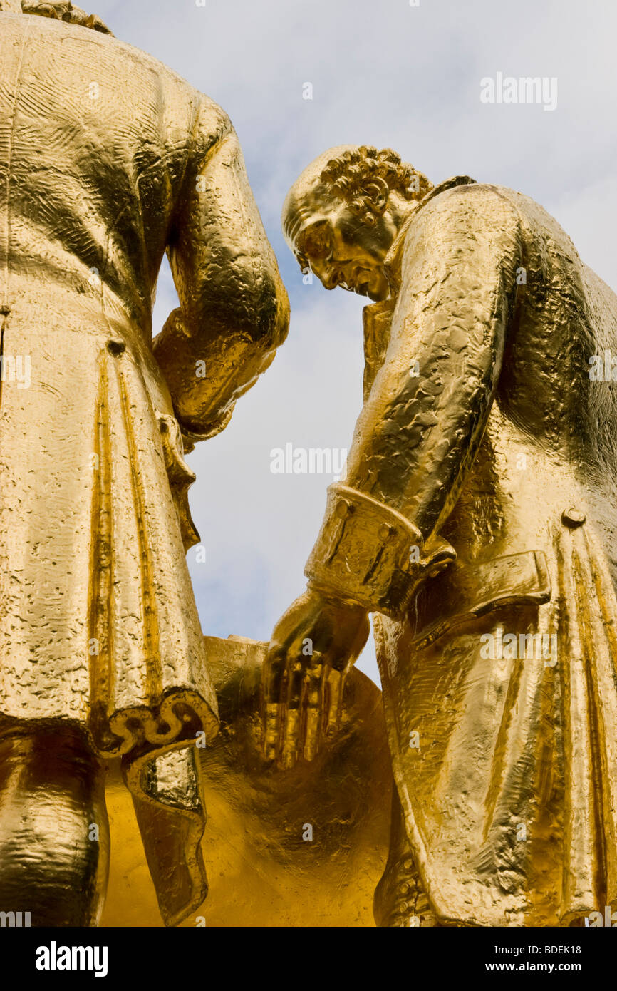 A trio of large gilt statues by sculptor W Bloye, unveiled in 1956, of ...