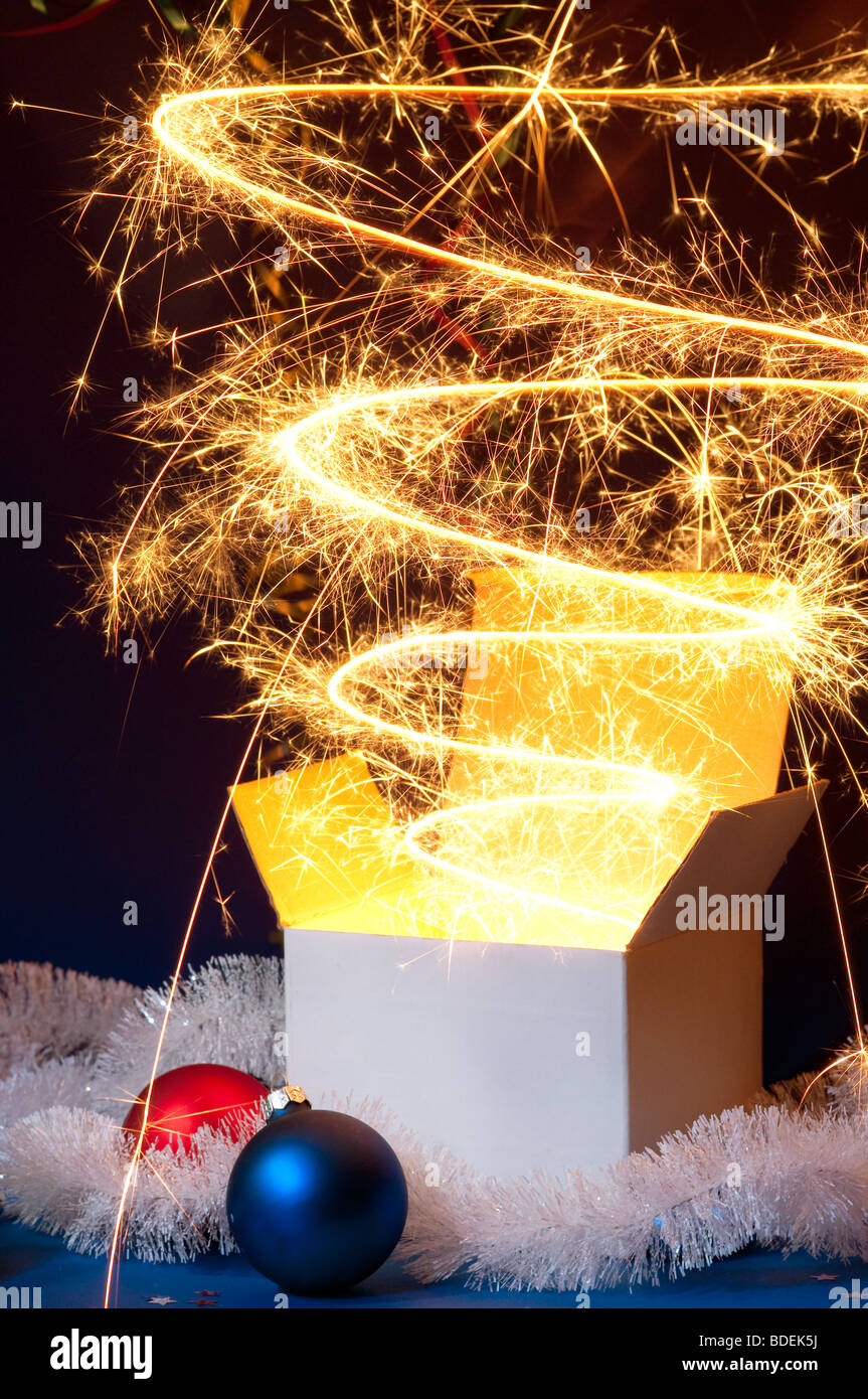 Opened cardboard box package with glowing light Stock Photo - Alamy