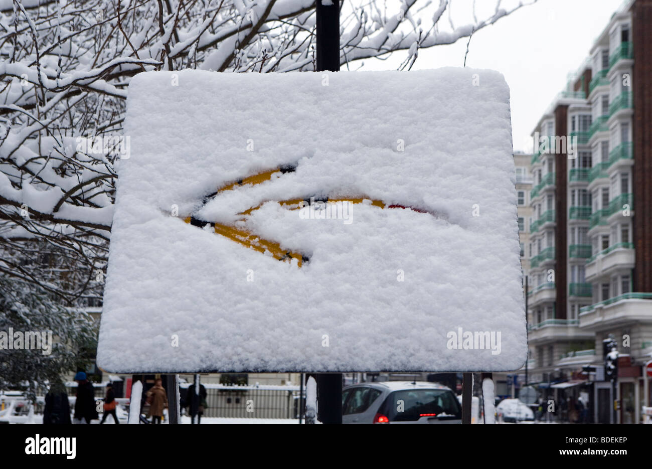 Modified Left Turn sign after heavy snowfall, London, England, UK ...
