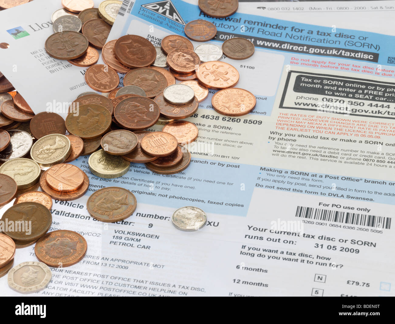 Bills and Small Change Stock Photo - Alamy