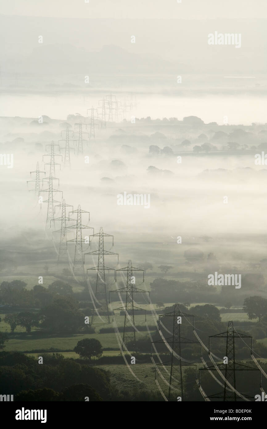 Electricity Pylons in Morning Mist. Marshwood Vale. Dorset. England. UK ...