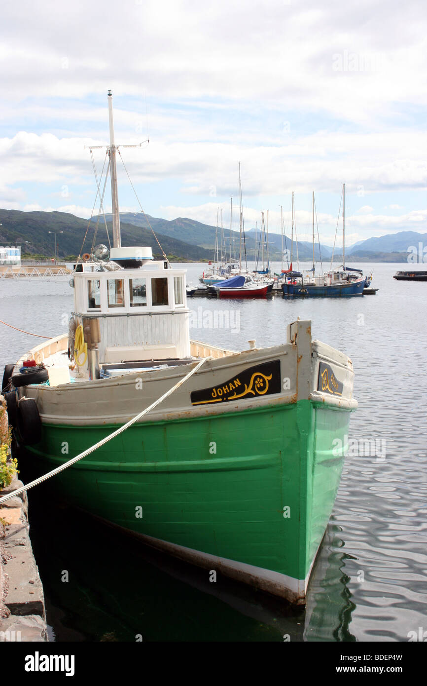 Fishing boat moored at the quayside of Kyleakin harbour , Isle of Skye ...