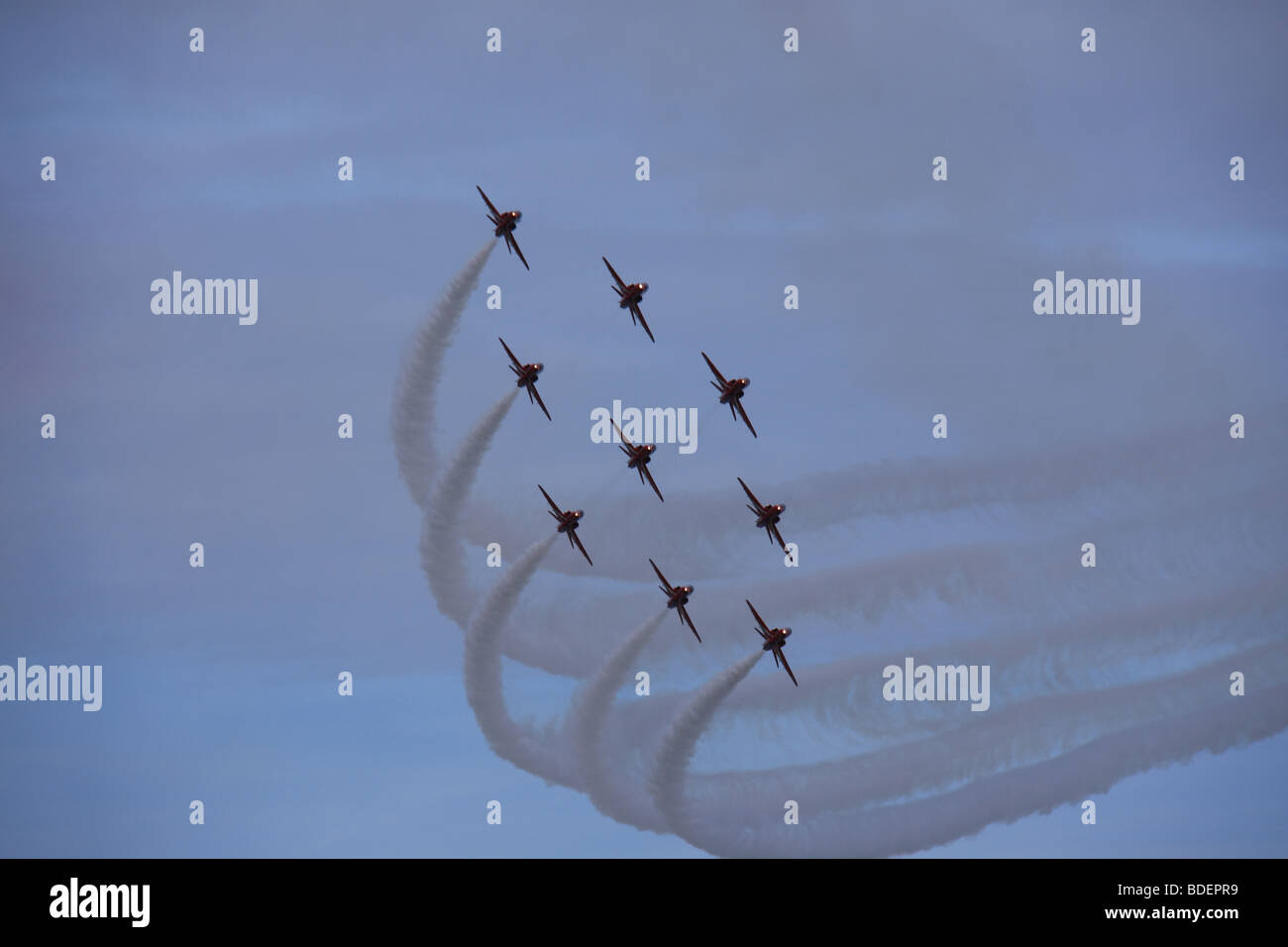 RAF Red Arrows Aerobatic team in close 9 formation Stock Photo - Alamy