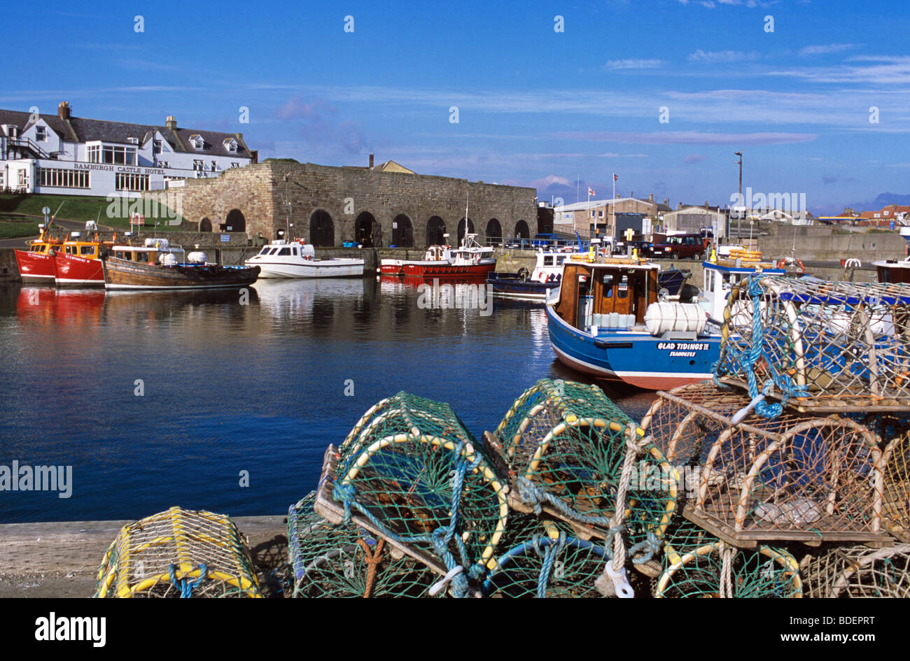 Lobster pots on the harbourside at the popular resort of Seahouses, a ...