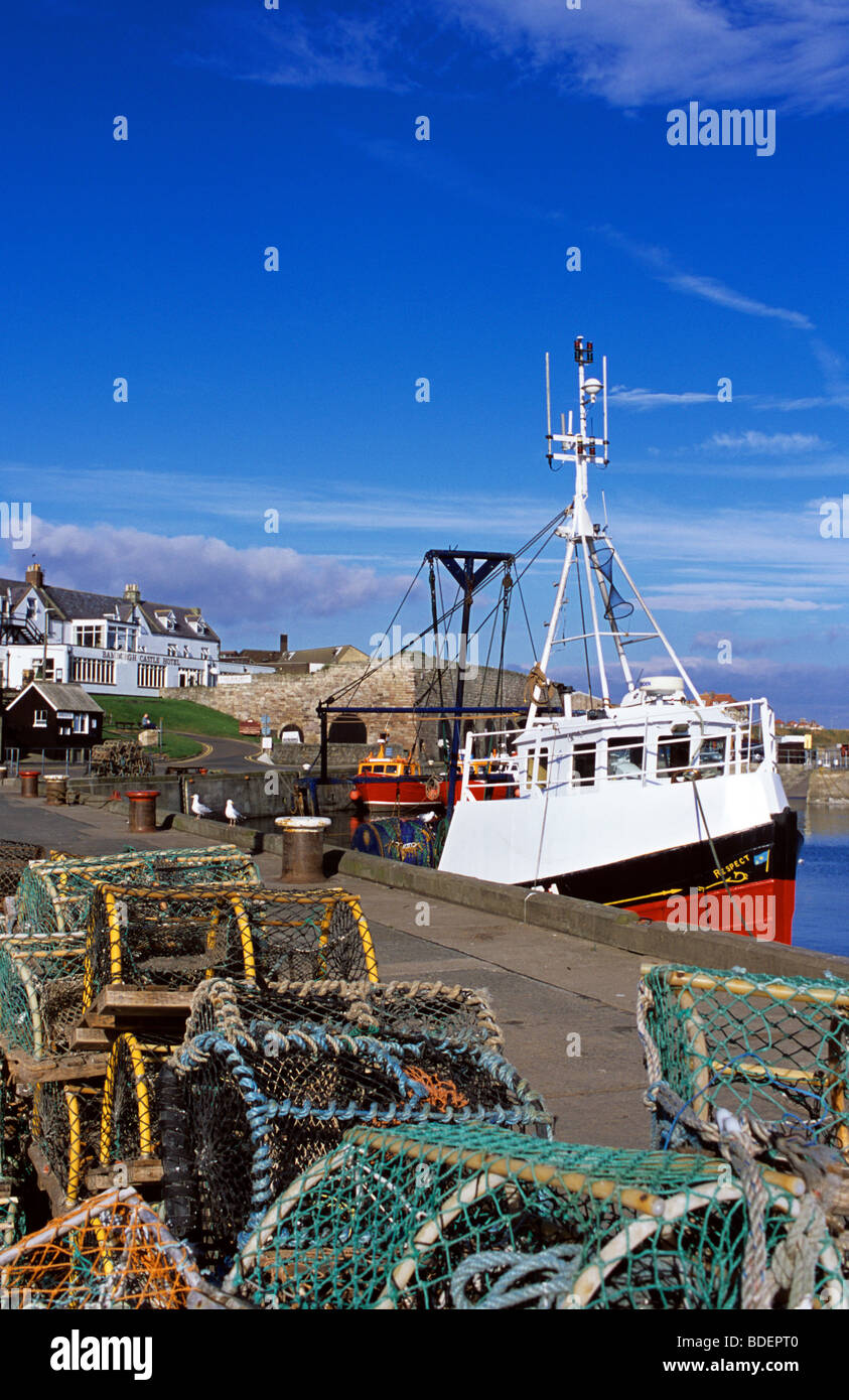 Lobster pots on the harbourside at the popular resort of Seahouses, a ...