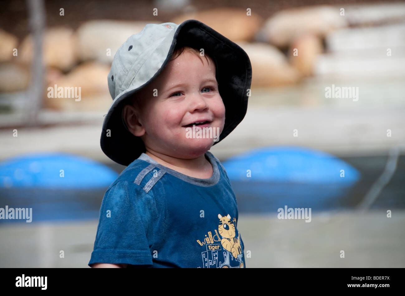 Smiling boy at the water park at Southbank Parkland, Brisbane ...