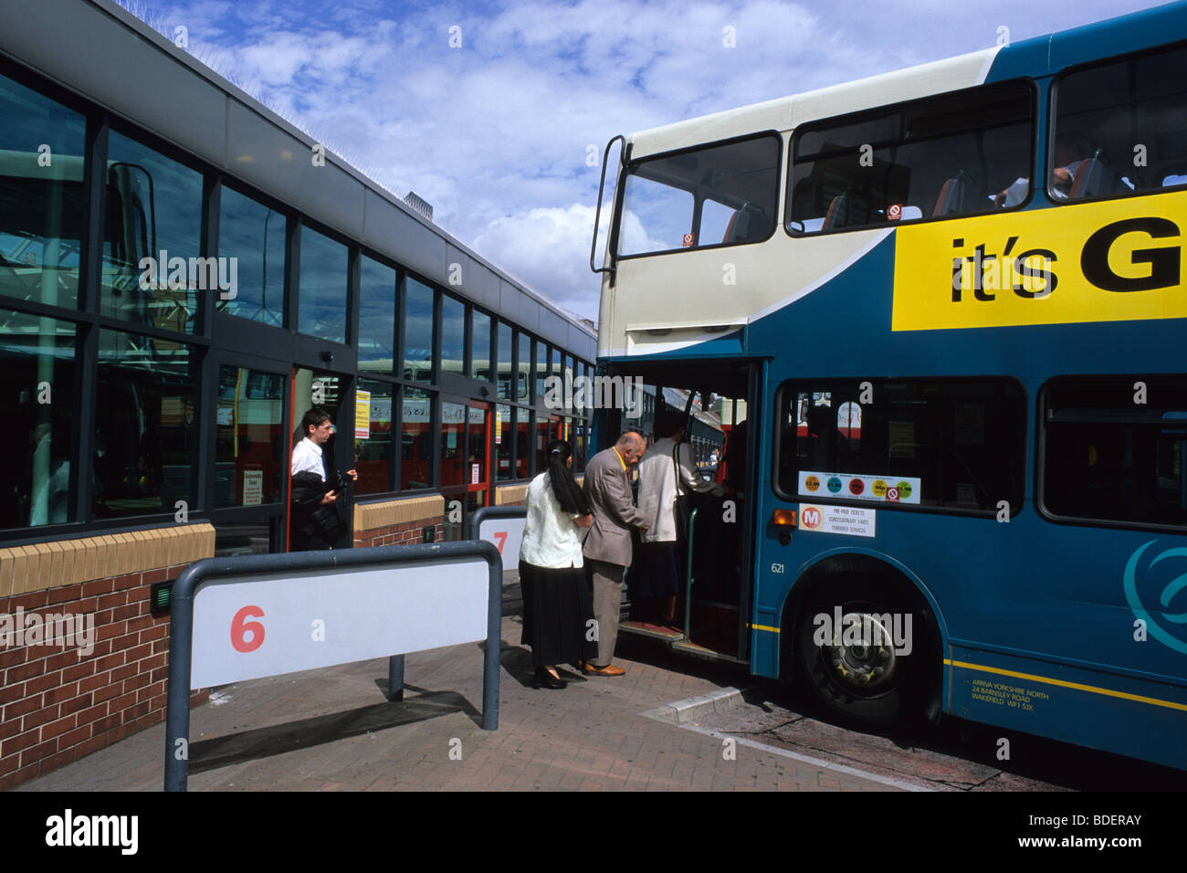 bus and passengers at Leeds city bus station Yorkshire UK Stock Photo ...