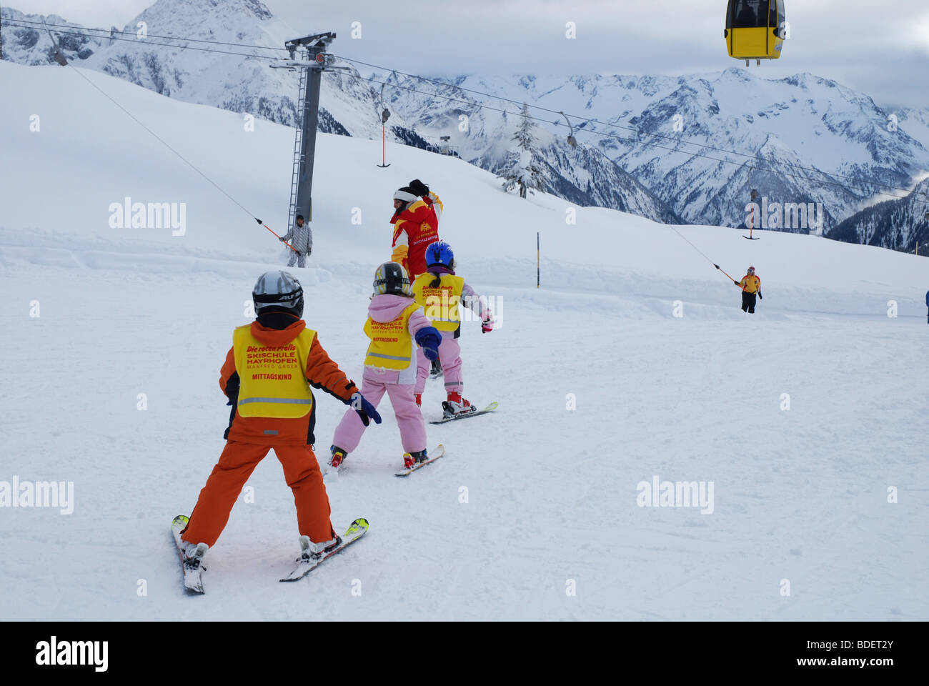 young children in ski class on mountain slope Zillertal Tirol Stock ...