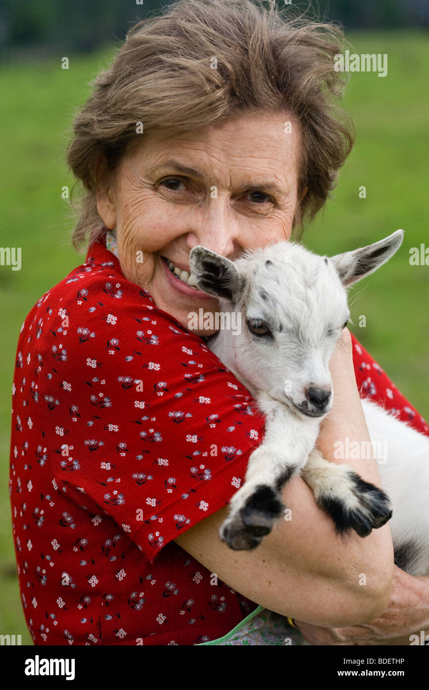 Senior woman farmer animal goat hi-res stock photography and images - Alamy