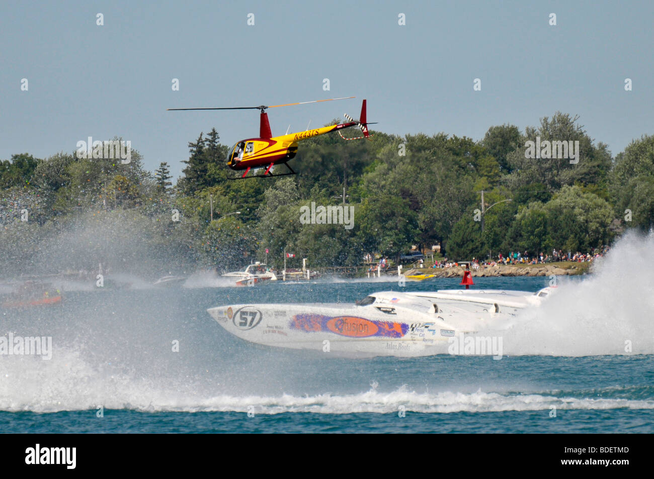 Helicopter chase photography plane during boat race Stock Photo - Alamy