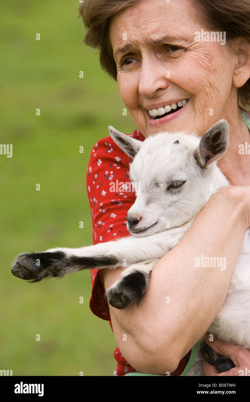 Senior woman farmer animal goat hi-res stock photography and images - Alamy