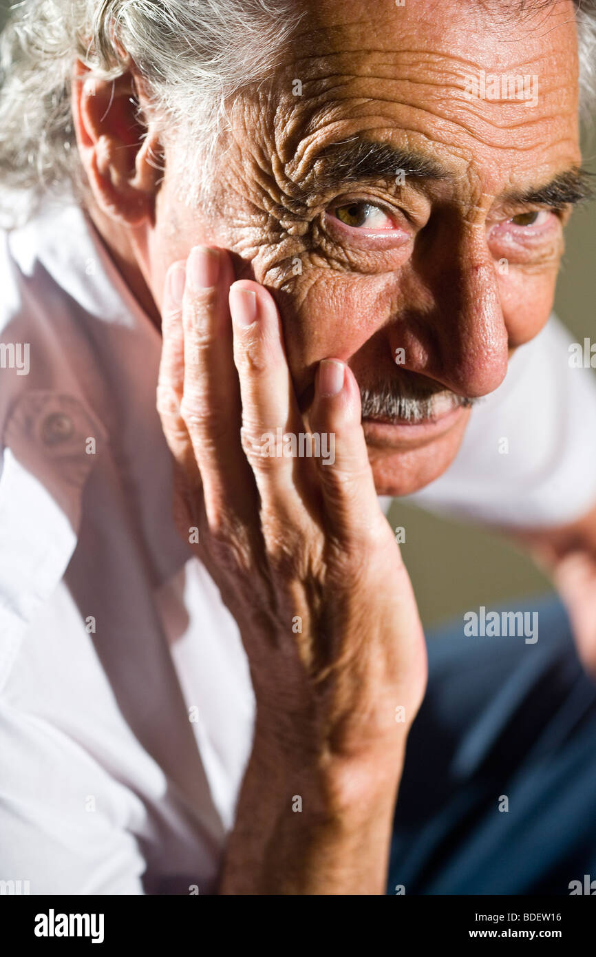 Wrinkled face of smiling old man Stock Photo - Alamy