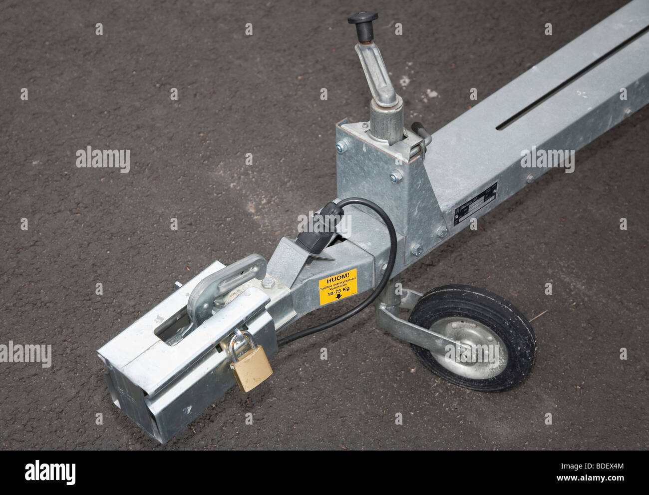 Locked trailer coupler Stock Photo - Alamy