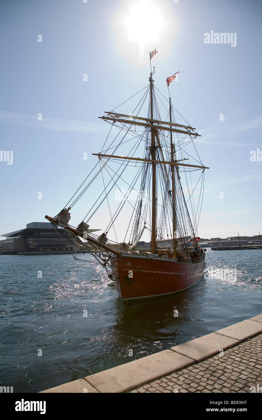 The 35 m topsail schooner "Lilla Dan" leaving the port of Copenhagen ...