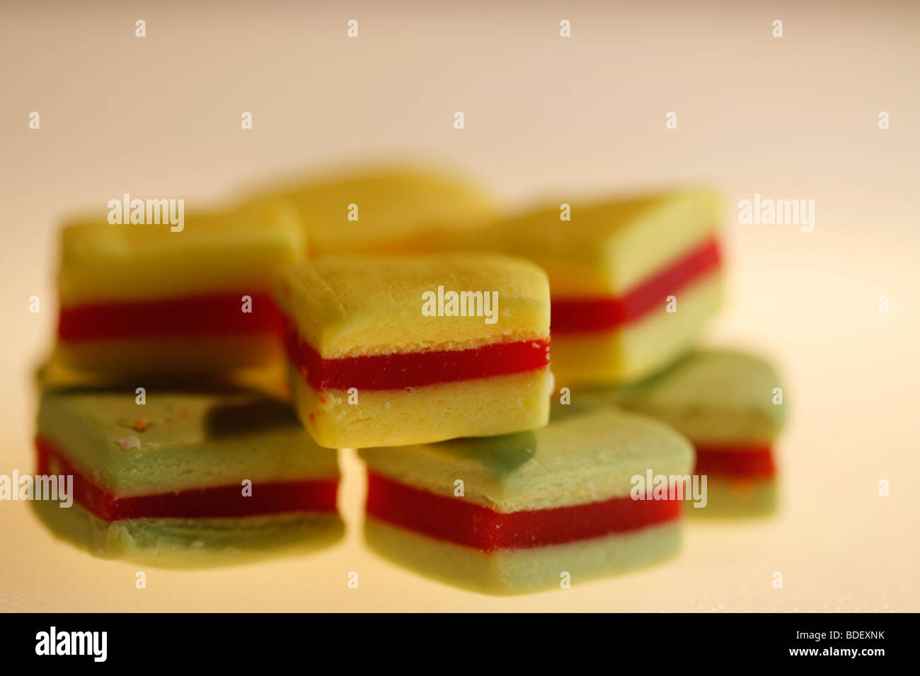 Stack of brightly coloured fruity allsorts sweets Stock Photo - Alamy