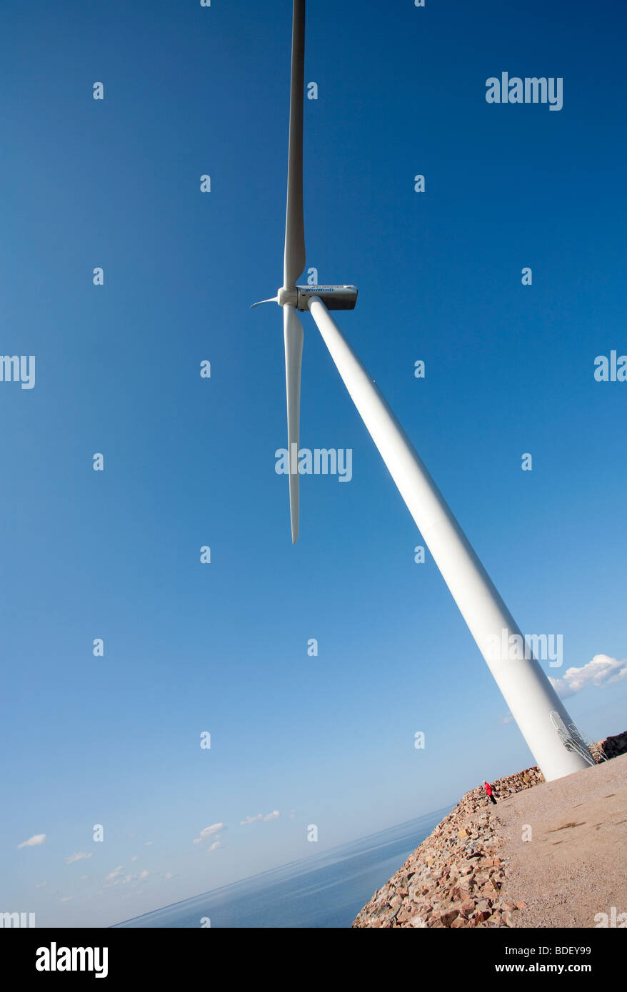 Tiny human and massive wind turbine , Finland Stock Photo - Alamy