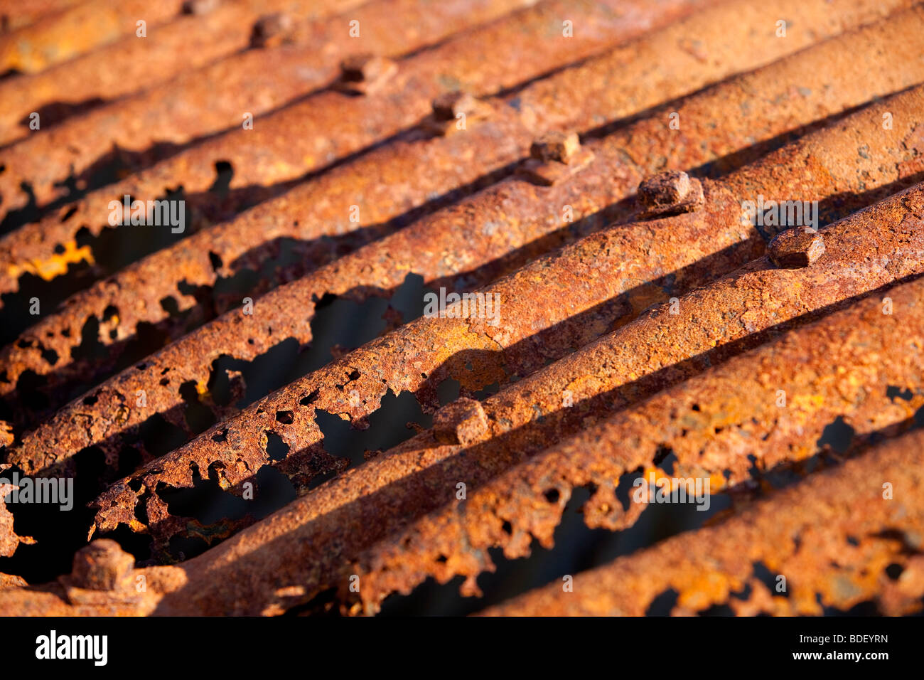 Surface of a badly corroded CGI ( corrugated iron ) steel structure ...
