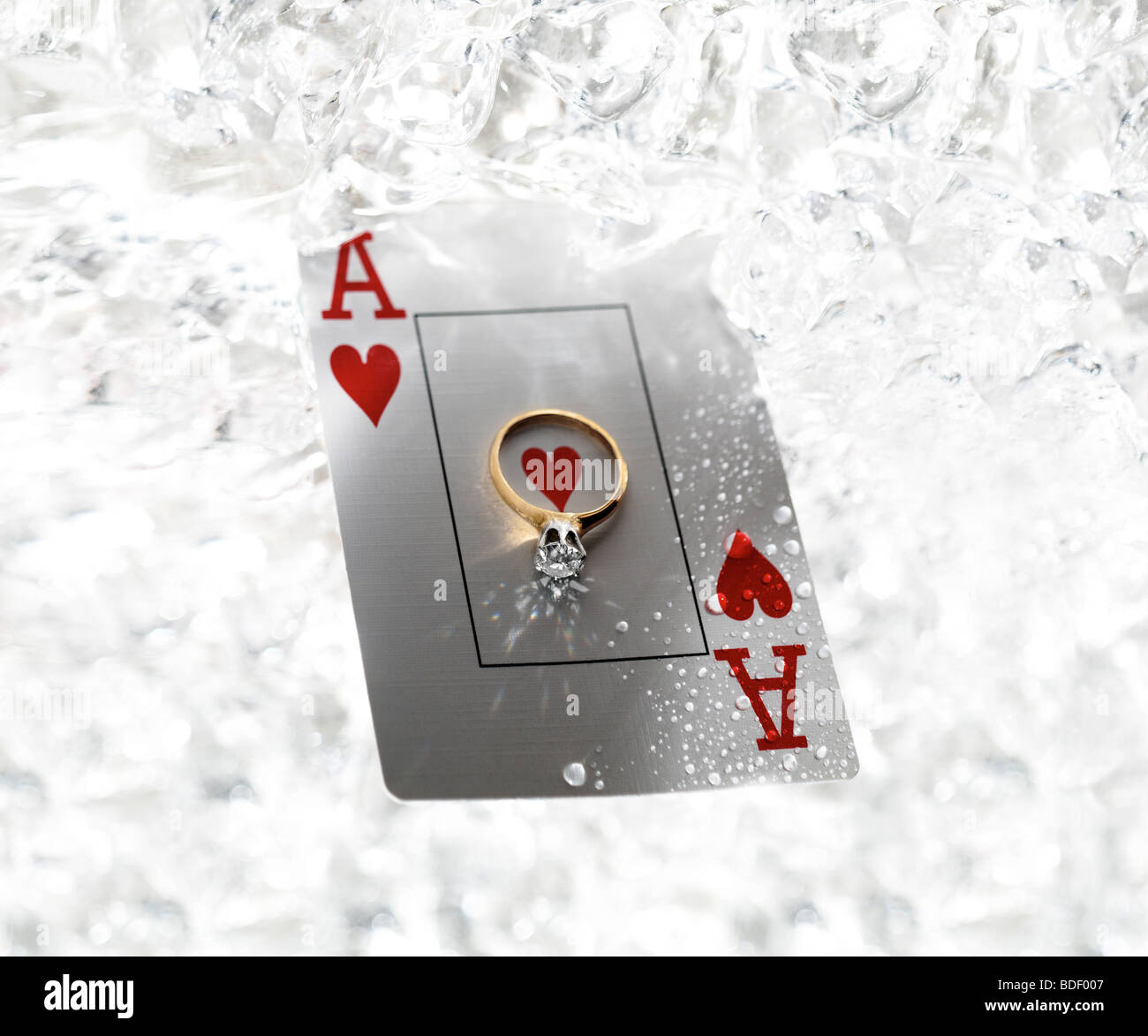 Diamond ring on an ace of hearts depicting the game of solitaire Stock ...
