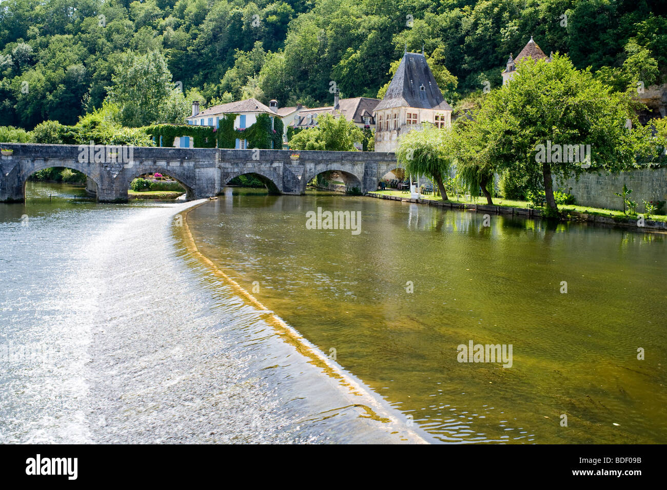 Weir on the river Dronne at Bantome in the Dordogne, France Stock Photo ...