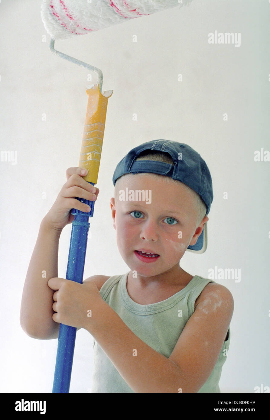 child painting wall Stock Photo - Alamy