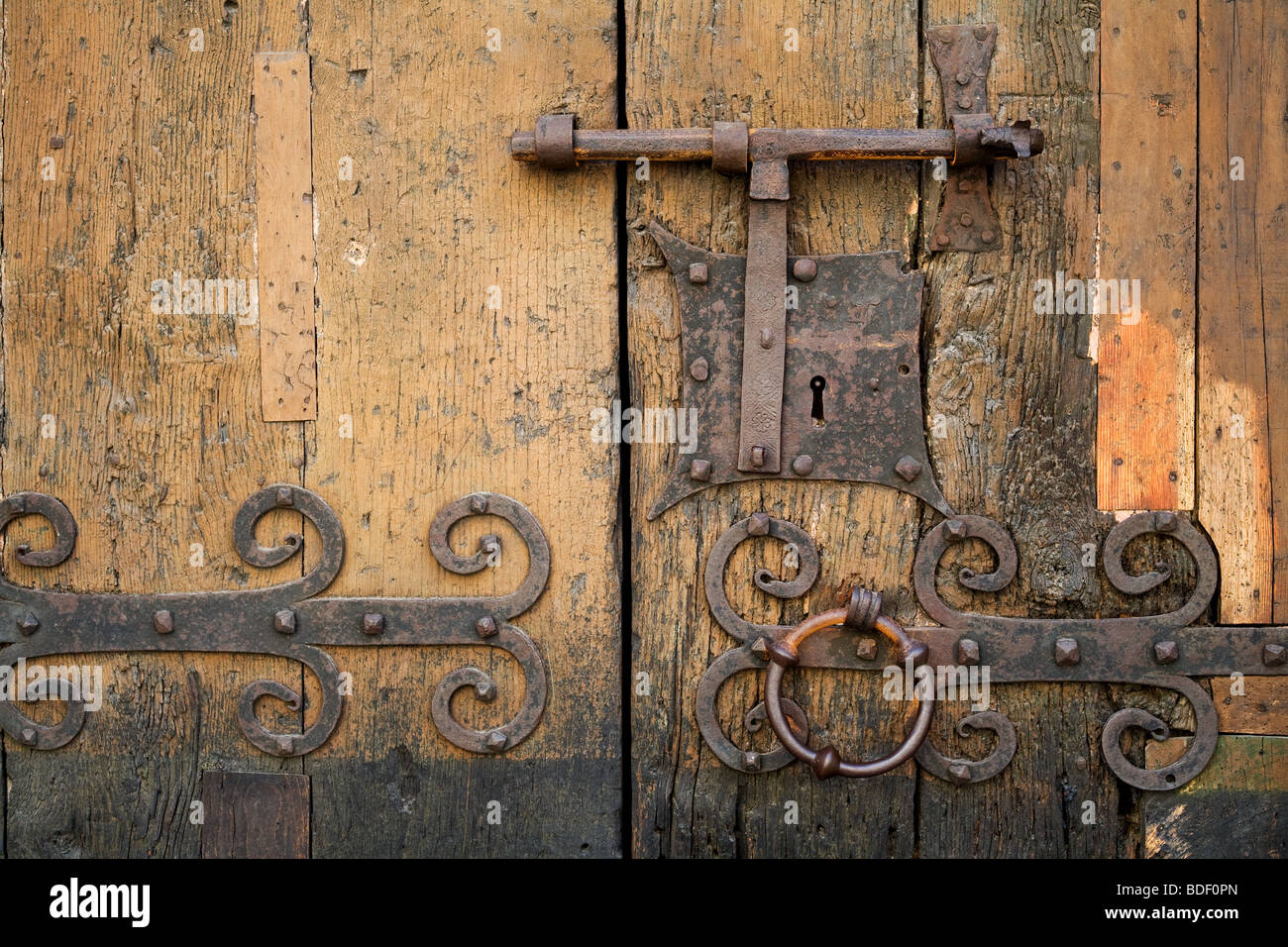 Old door and metal lock Stock Photo - Alamy