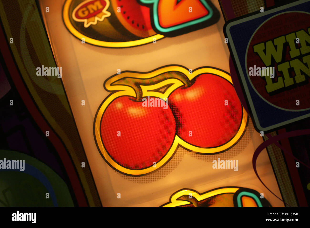 Pair of cherries detail on a one arm bandit gaming machine Stock Photo ...