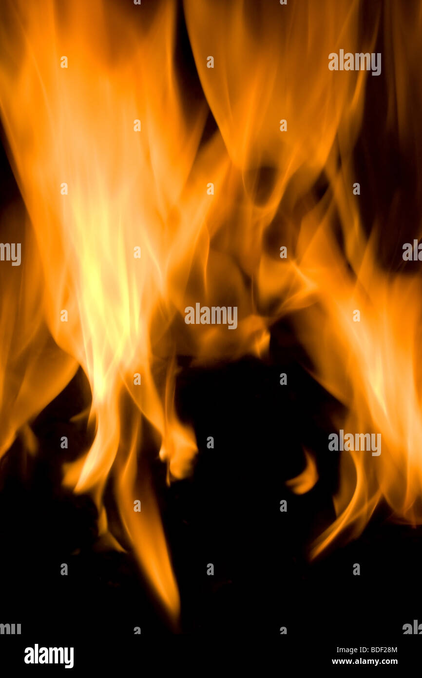 Bright orange flames leaping from a coal fire Stock Photo - Alamy