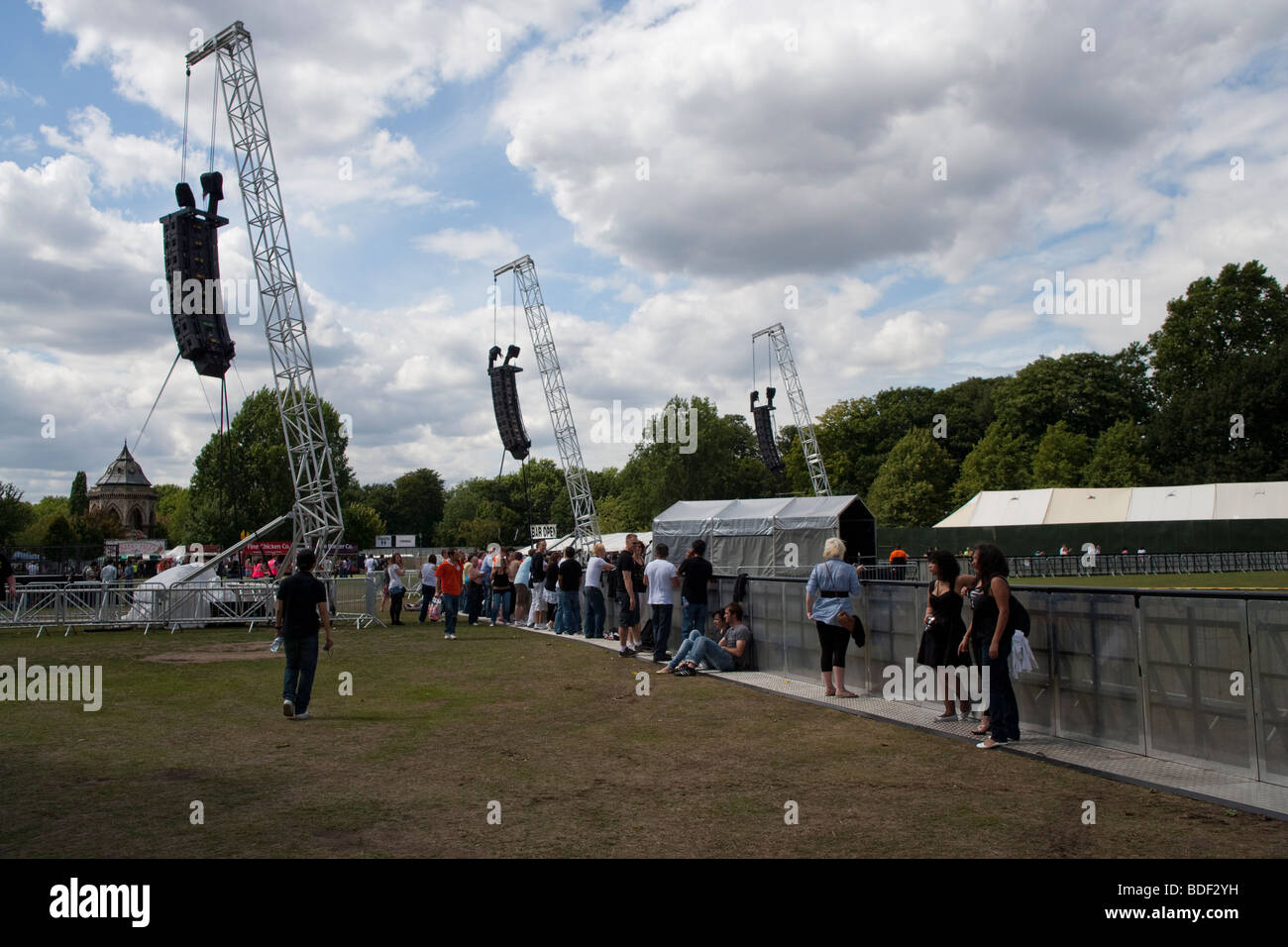band concert crowd fun fair lake district swings tents young Stock ...