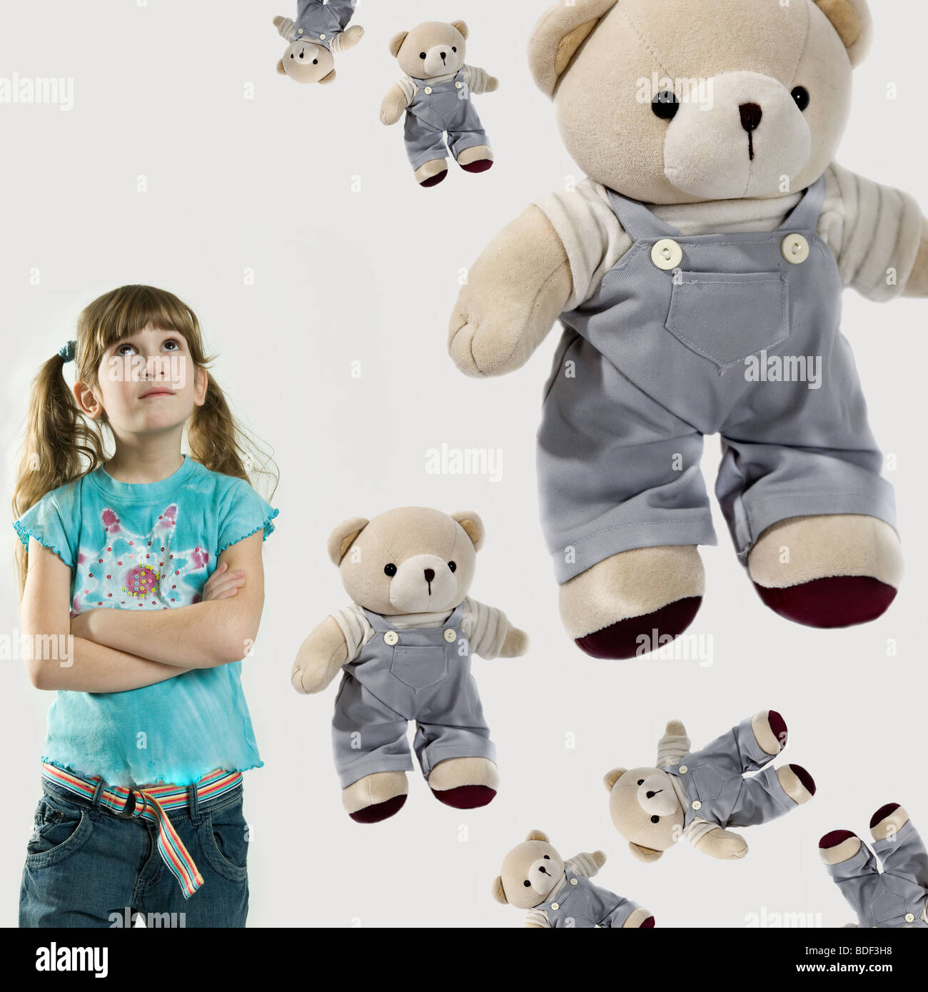 young cute girl with fallen bear Stock Photo - Alamy