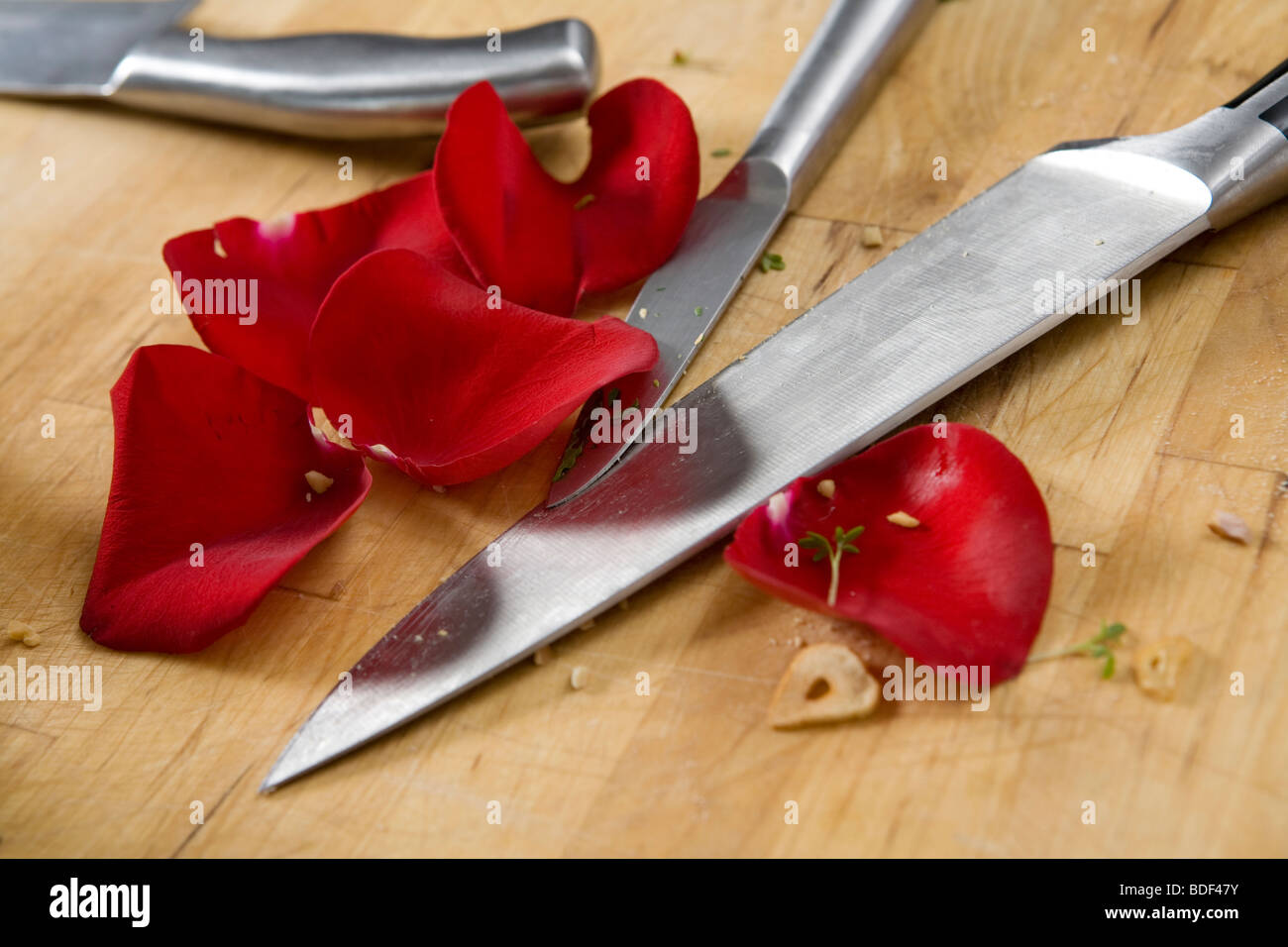 Petal rose and knife Stock Photo - Alamy