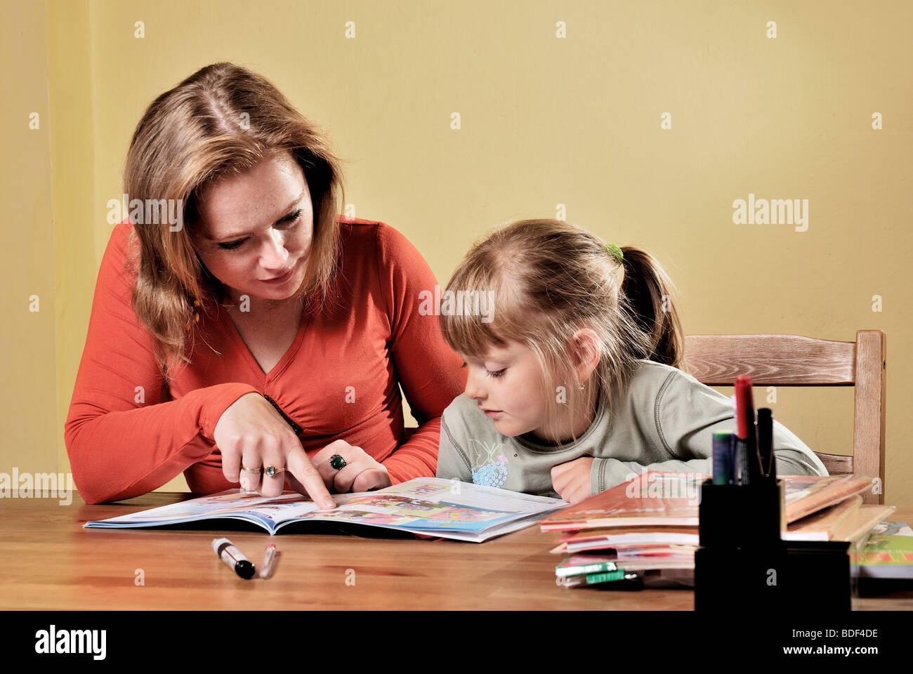 Seated tutor hi-res stock photography and images - Alamy