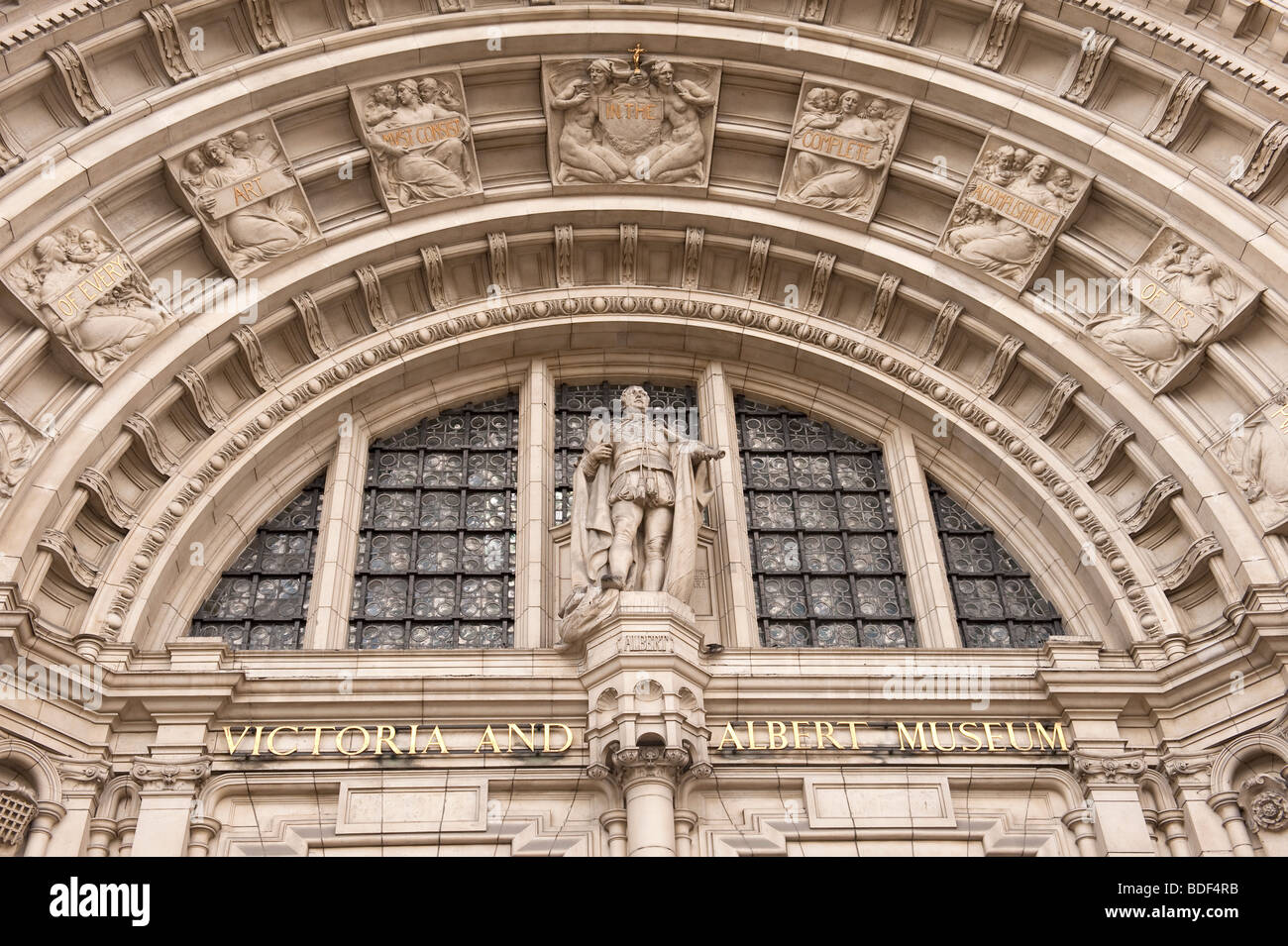 Close up of the architectural stone carved detail including name above ...