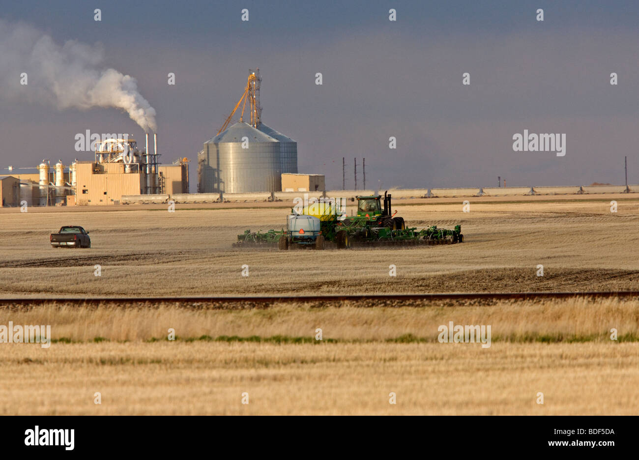 Farming seeding and Potash Industry in Background Stock Photo - Alamy