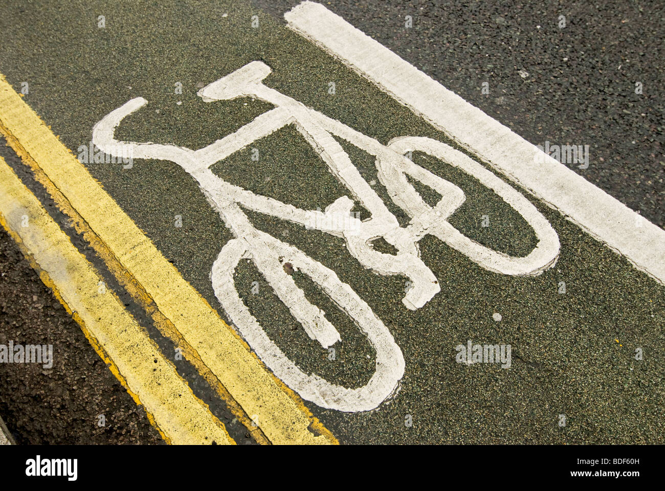 Painted road sign indicating a cycle lane in Central London UK Stock ...