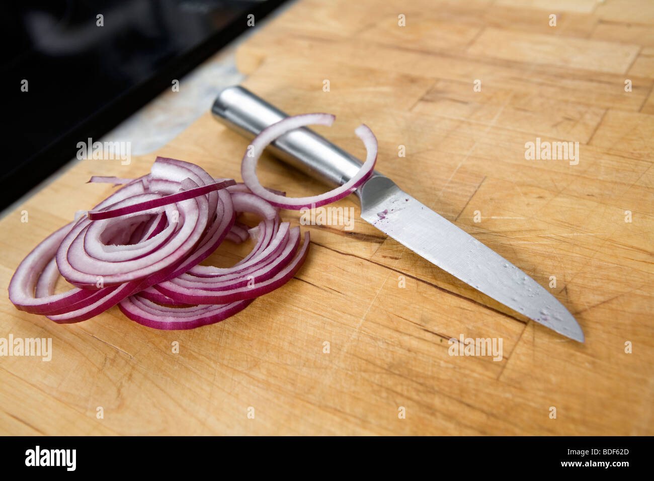 knife with onion Stock Photo - Alamy