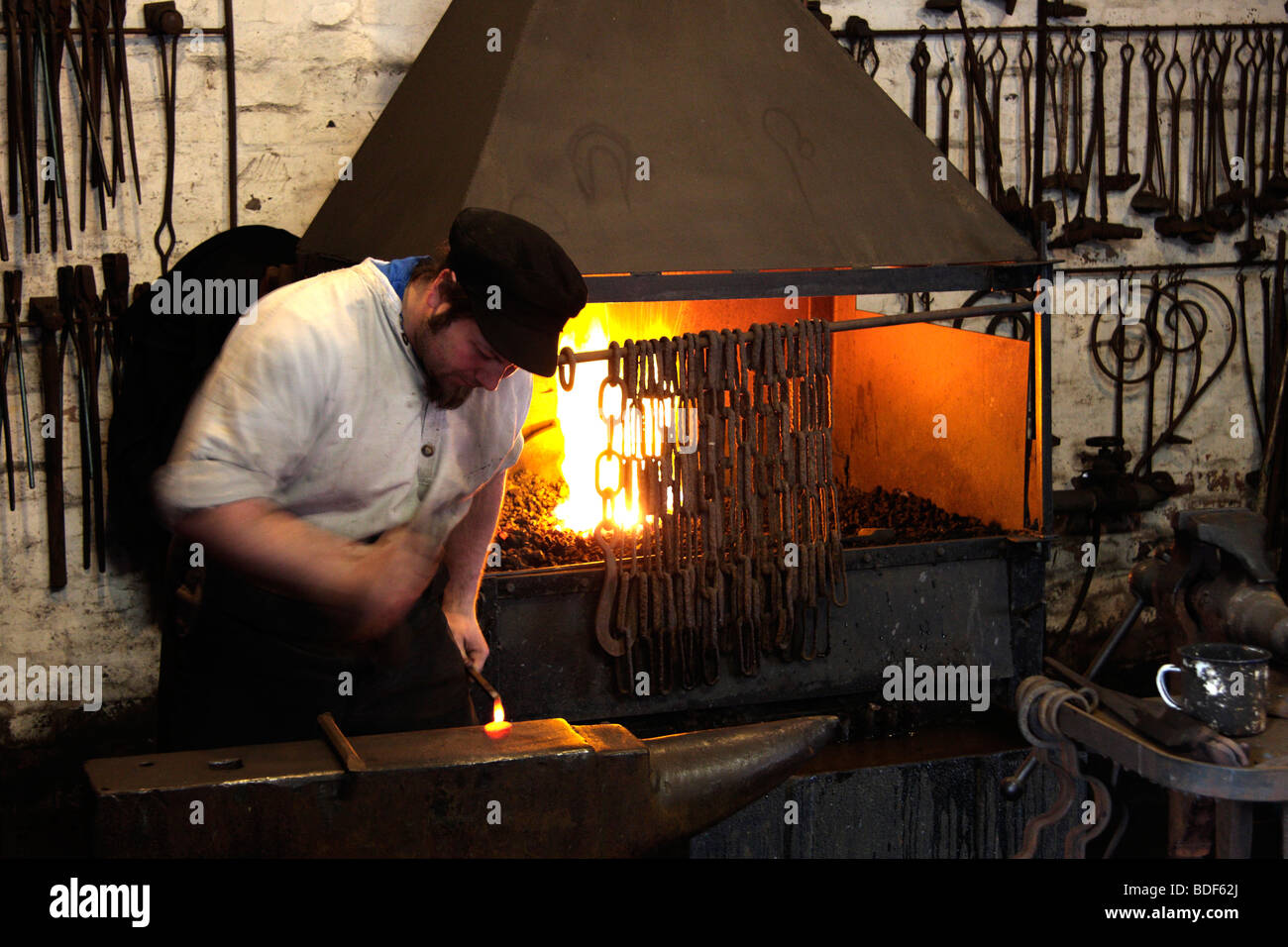 Blacksmith at work Stock Photo - Alamy