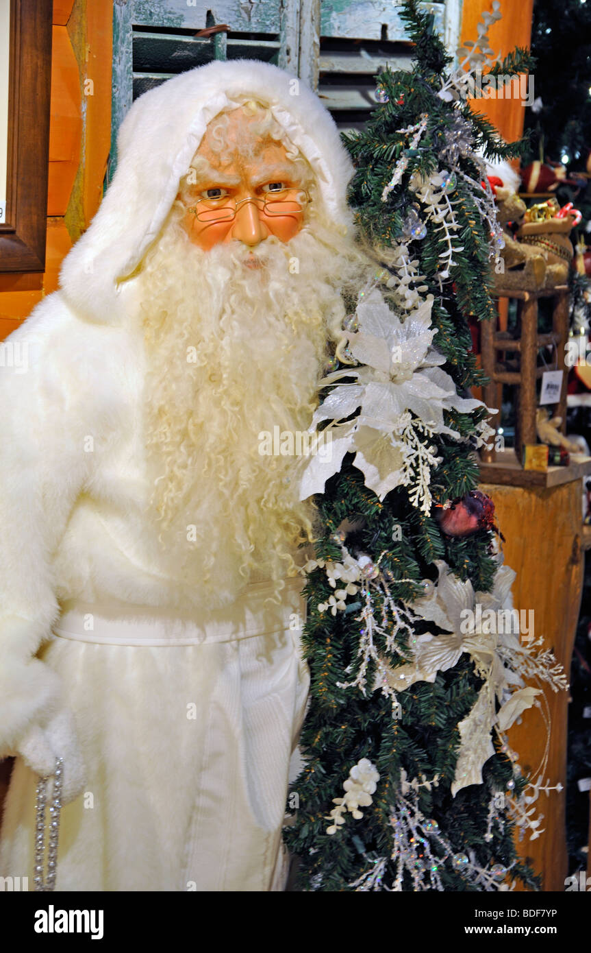 Santa with Christmas tree Stock Photo - Alamy