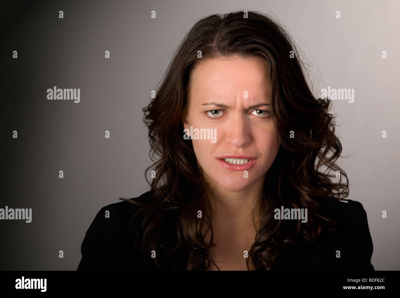 Woman angry expression grinding teeth hi-res stock photography and ...