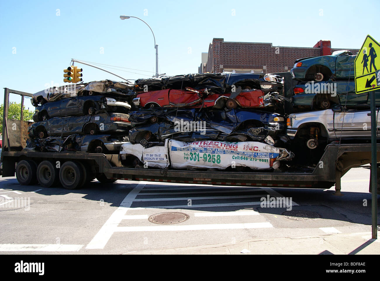Car wrecks are being transported Stock Photo - Alamy