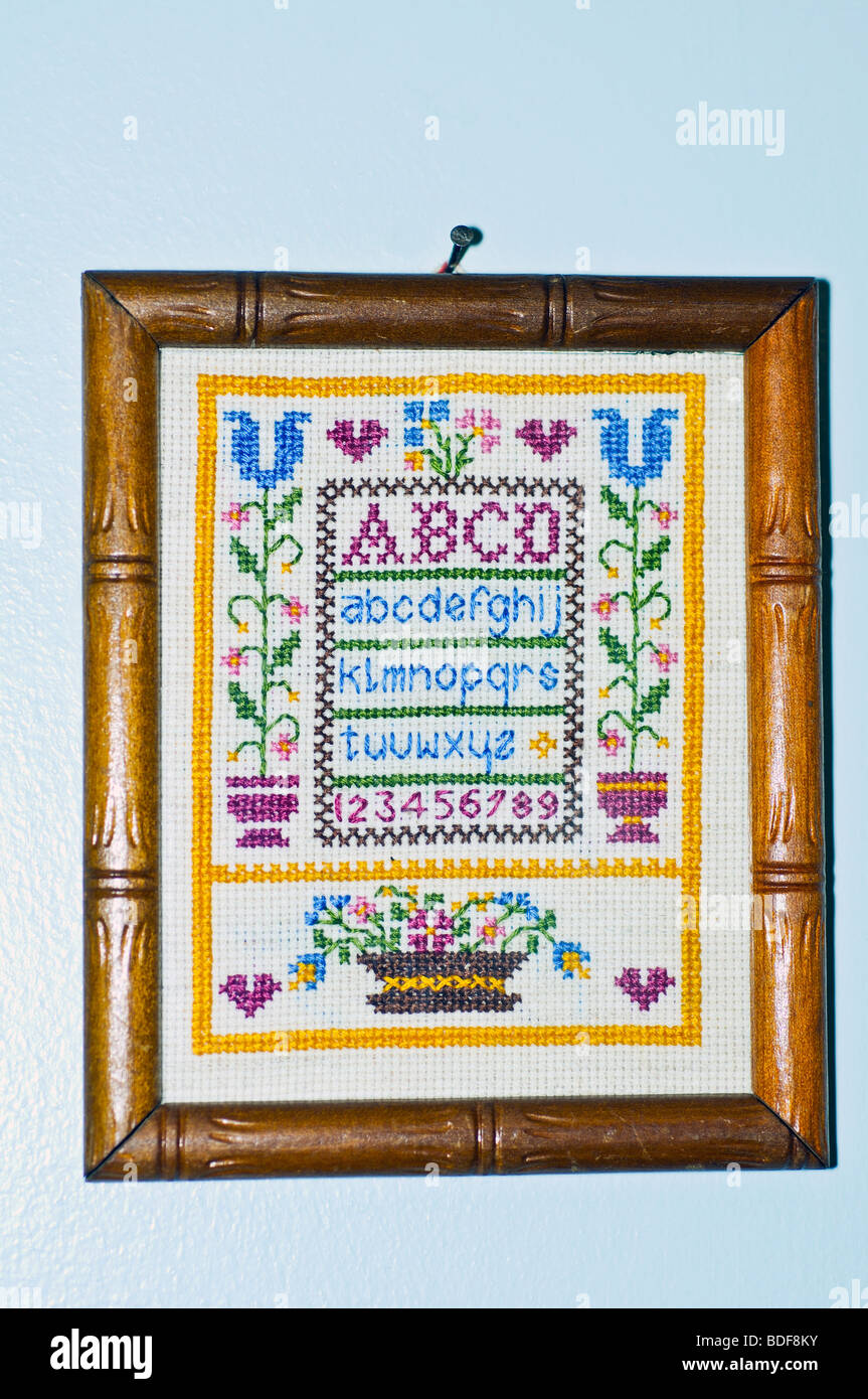 Traditional American heirloom embroidery featuring alphabet and numbers ...