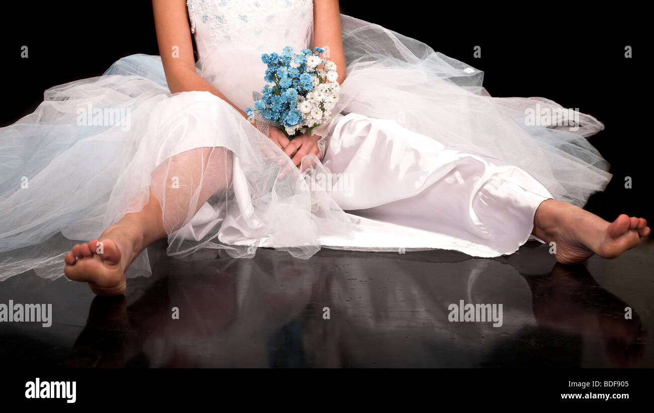 Bride sitting on floor hi-res stock photography and images - Alamy
