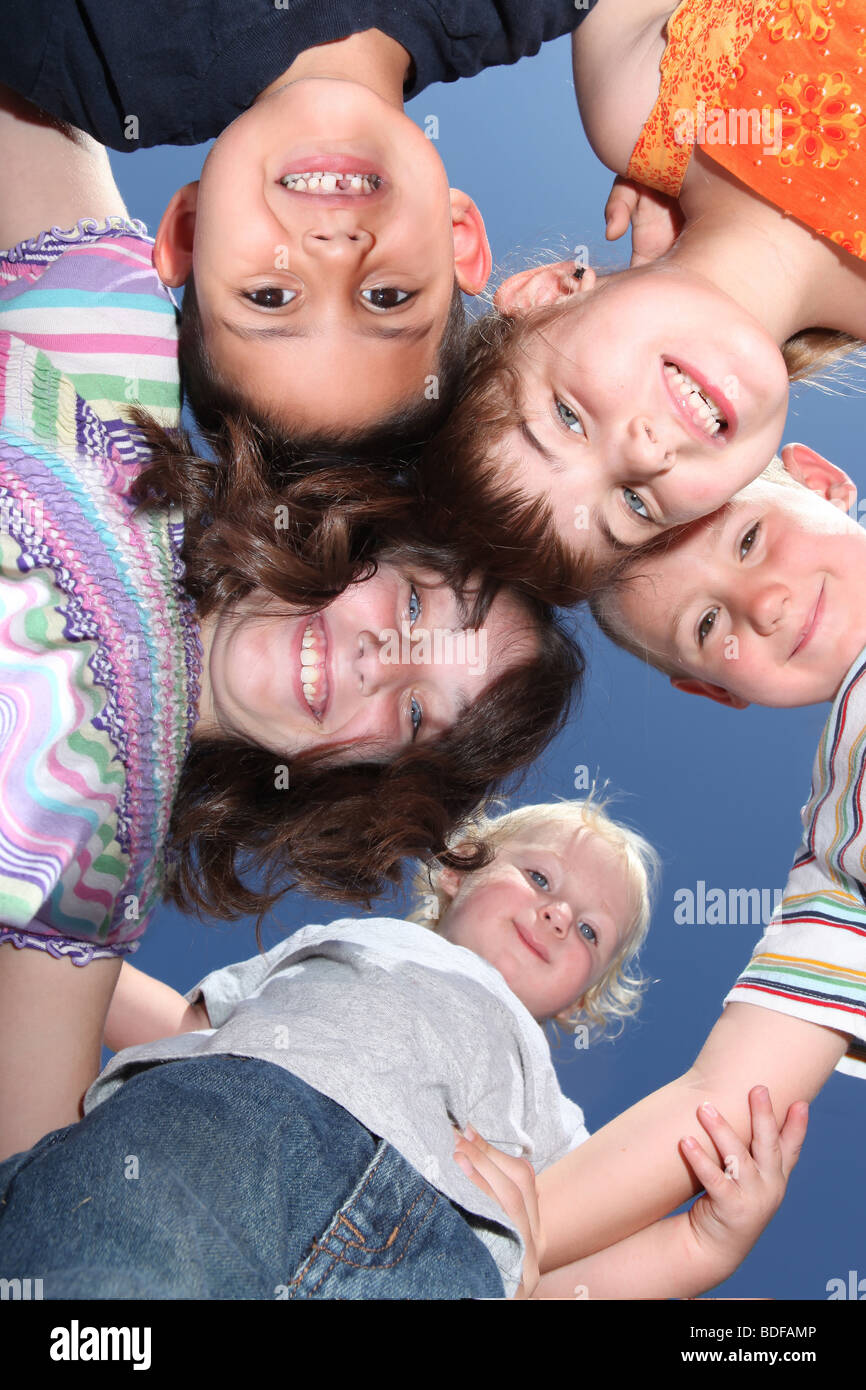 Group of Happy Smiling Young Kids Outside Having Fun Stock Photo - Alamy