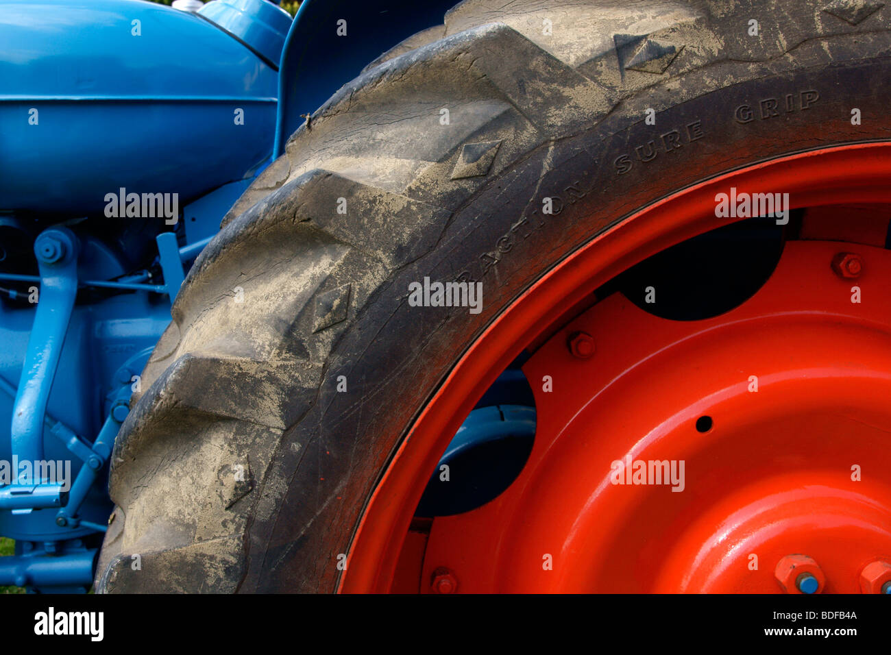 An orange wheel of a Fordson Power Major tractor Stock Photo - Alamy